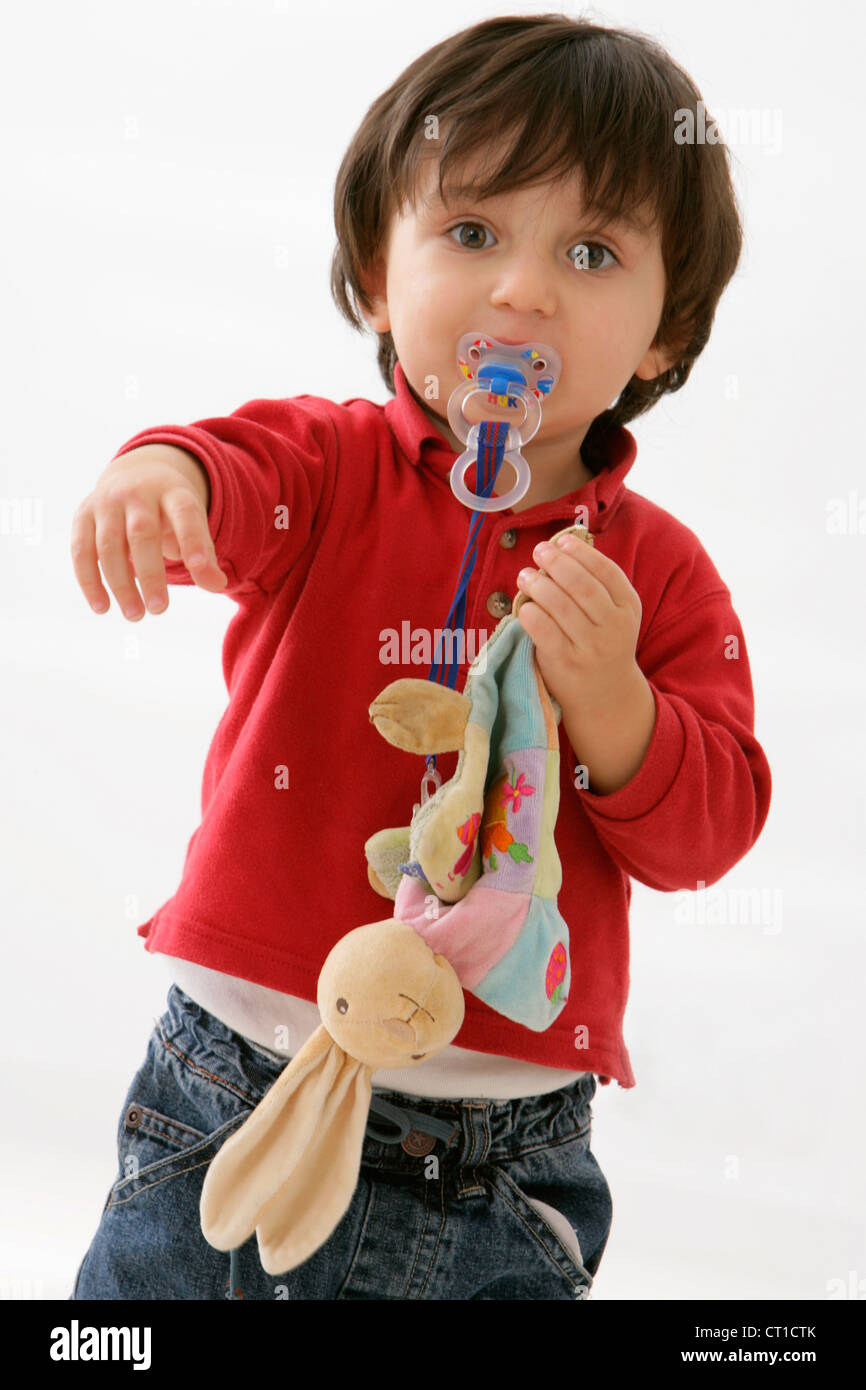 Sucking pacifiers hi-res stock photography and images - Alamy