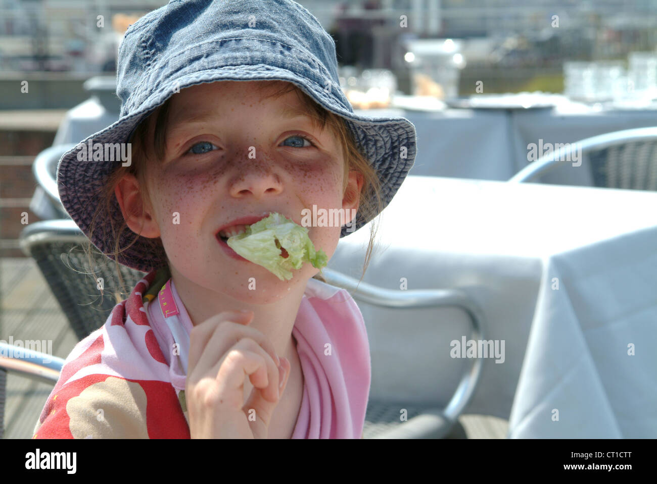 CHILD EATING RAW VEGETABLES Stock Photo - Alamy