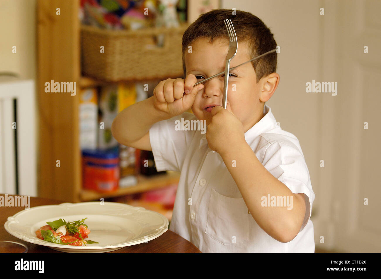 CHILD EATING RAW VEGETABLES Stock Photo - Alamy