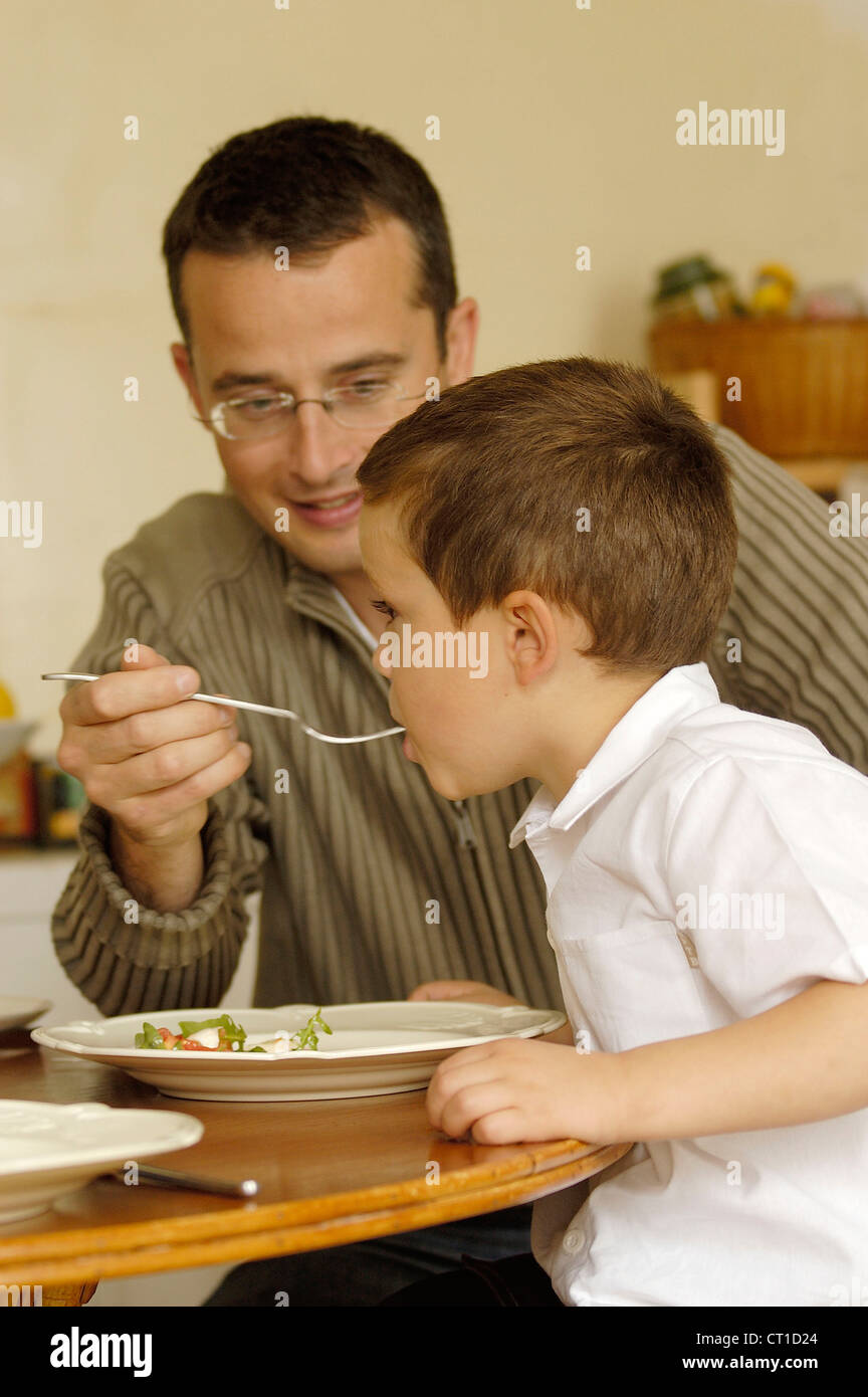 CHILD EATING RAW VEGETABLES Stock Photo - Alamy