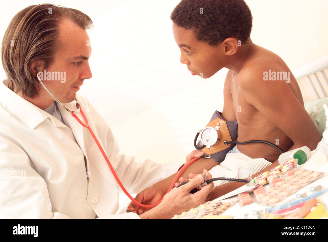 BLOOD PRESSURE, CHILD Stock Photo - Alamy