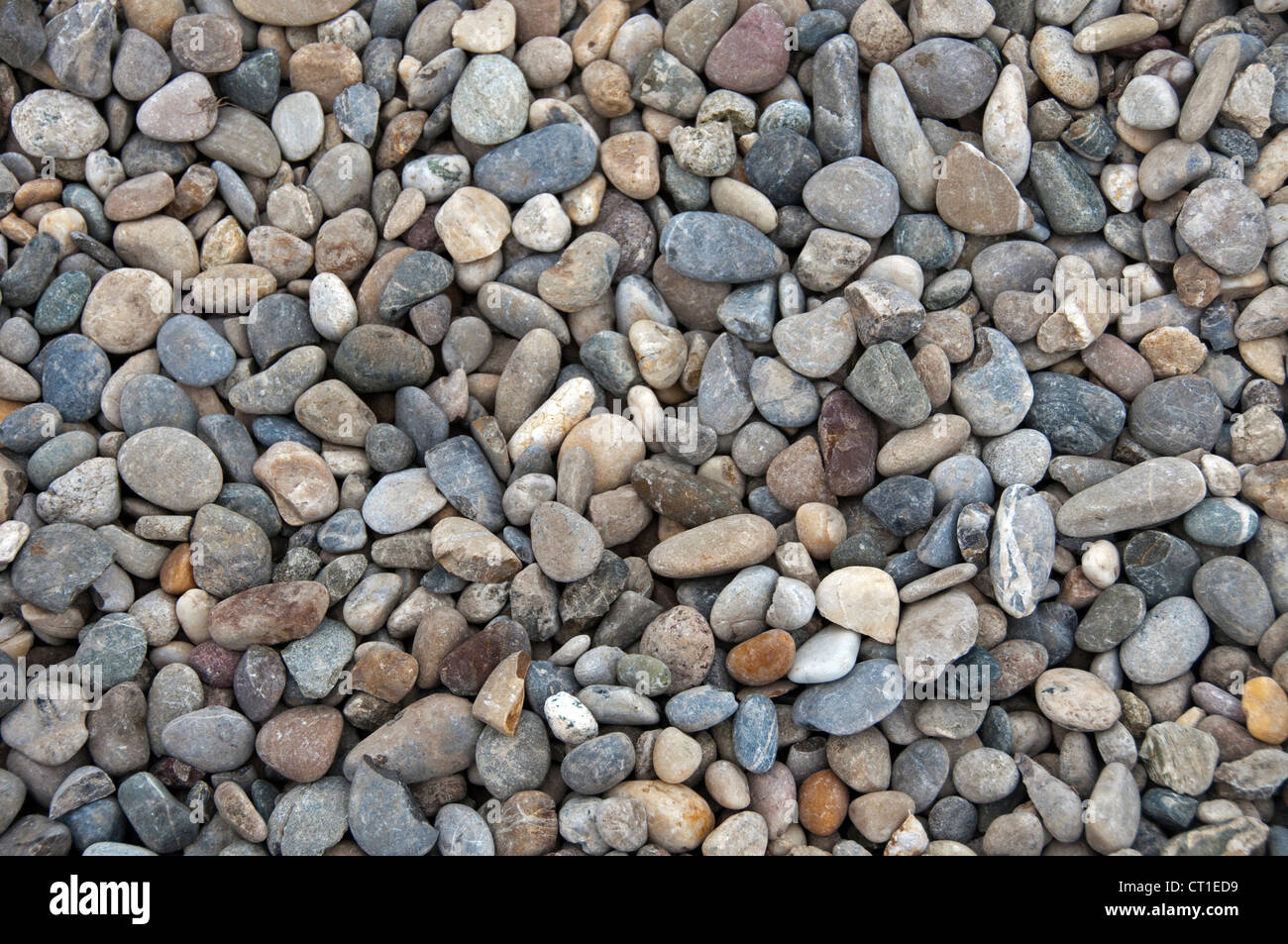 grid gravel background with different shapes of rocks Stock Photo - Alamy