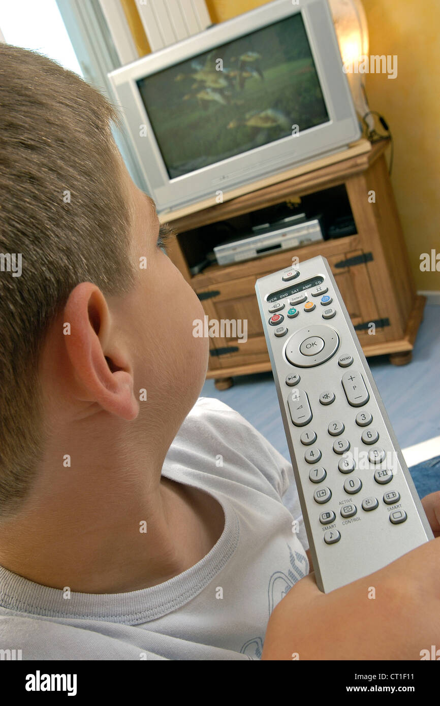 Child watching tv and 11 year hi-res stock photography and images - Alamy