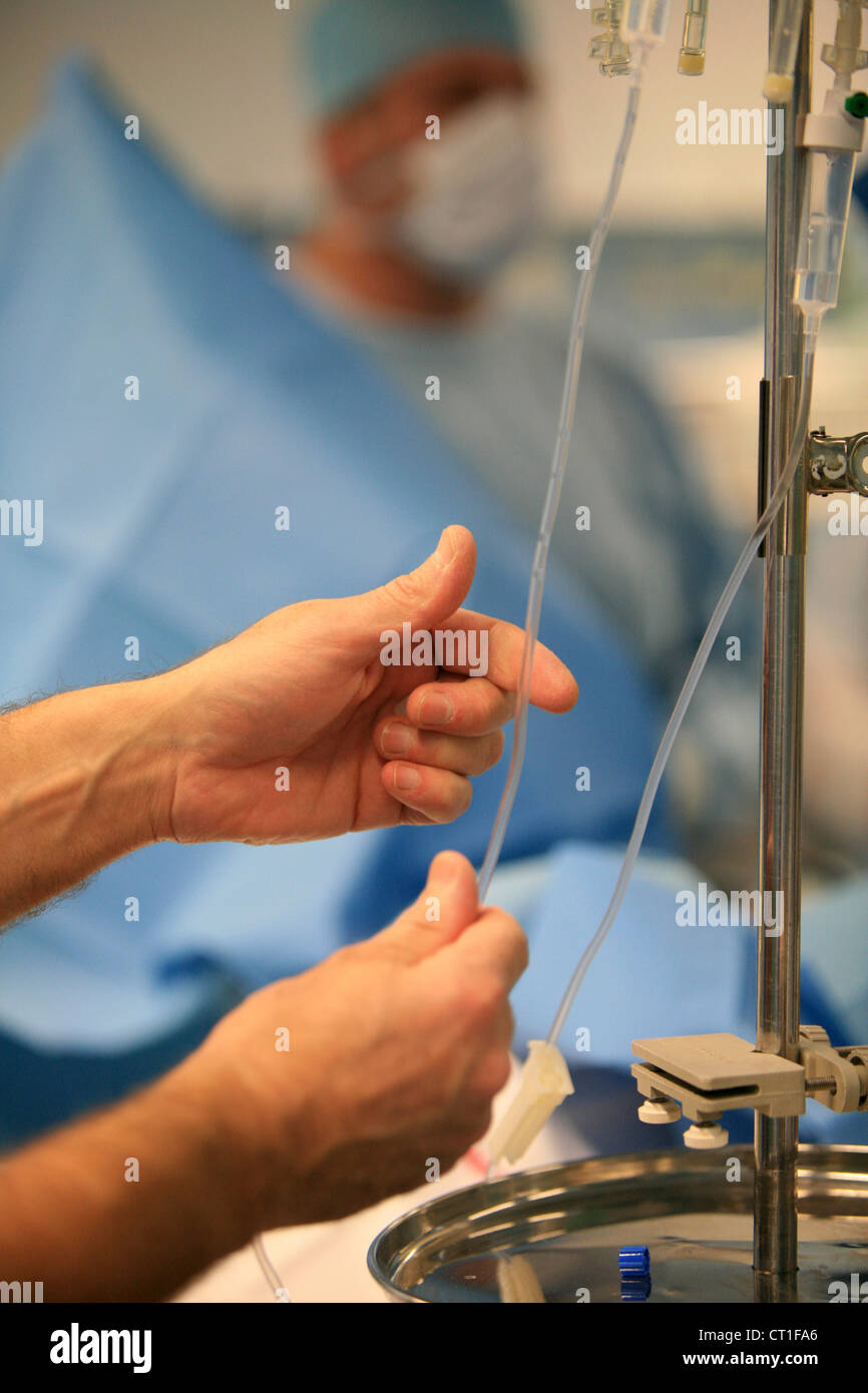 Closeup hands hospital drip hi-res stock photography and images - Alamy