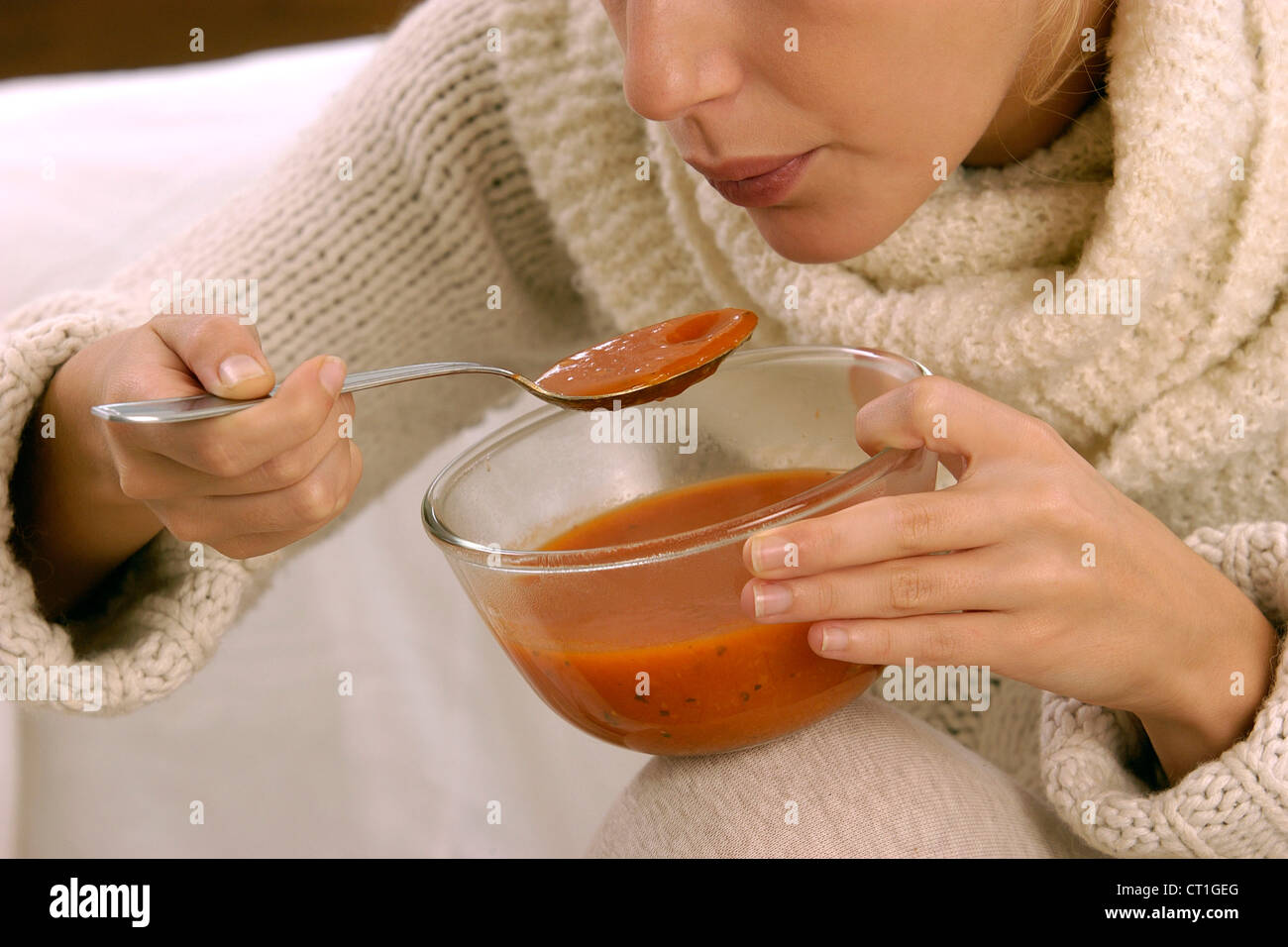 WOMAN EATING SOUP Stock Photo - Alamy