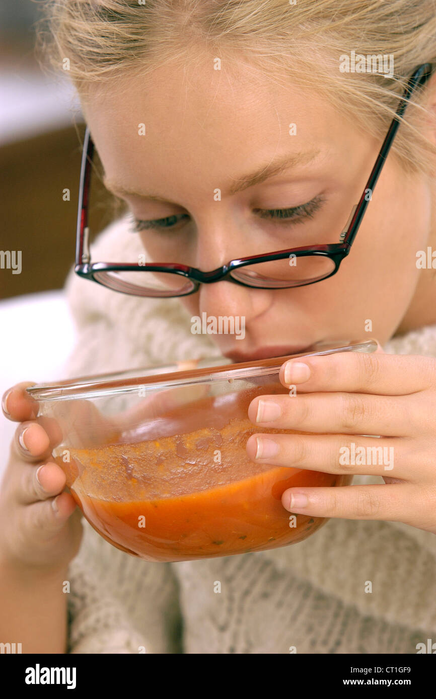 WOMAN EATING SOUP Stock Photo - Alamy