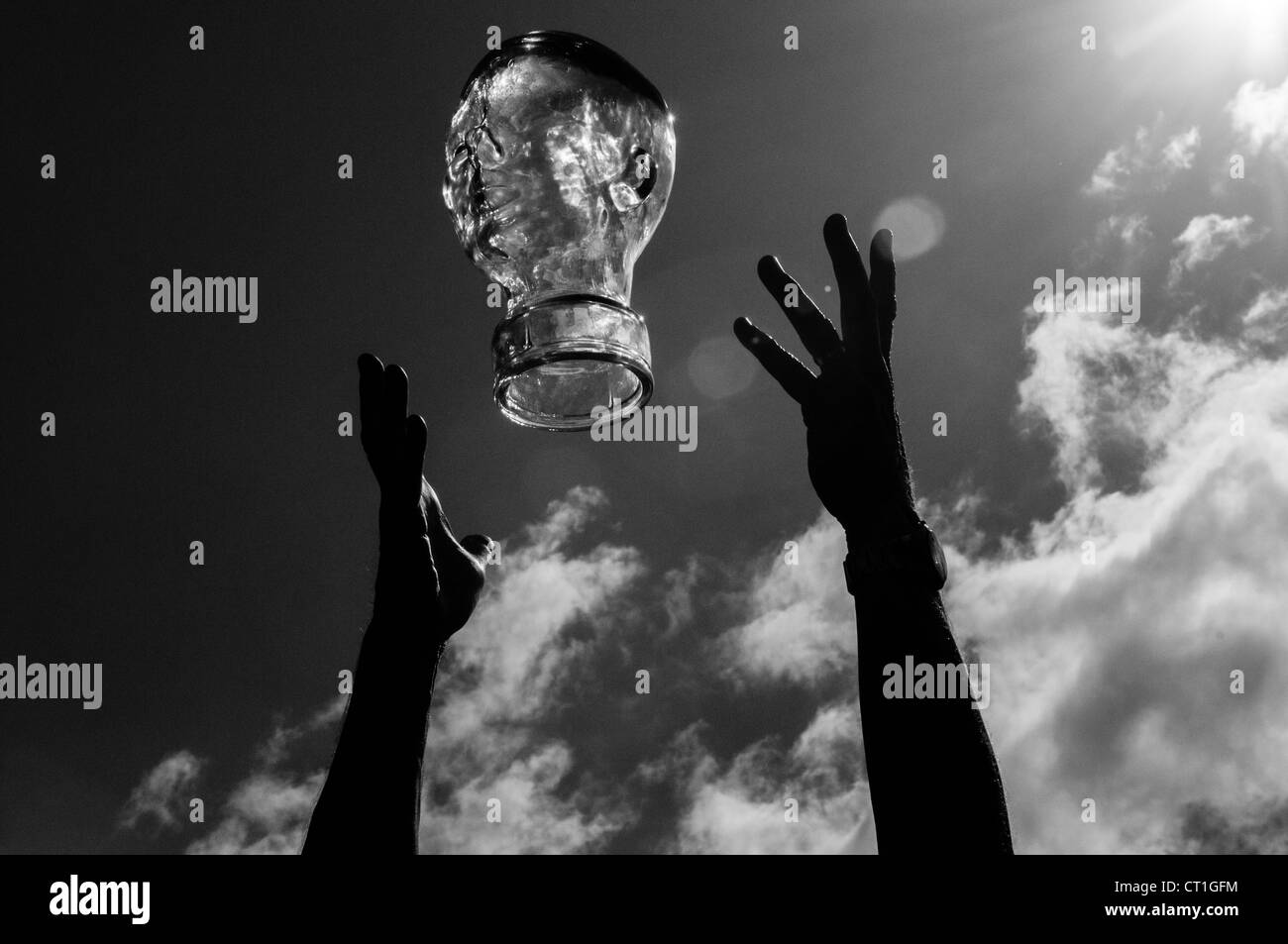 Hands by head Black and White Stock Photos & Images - Alamy