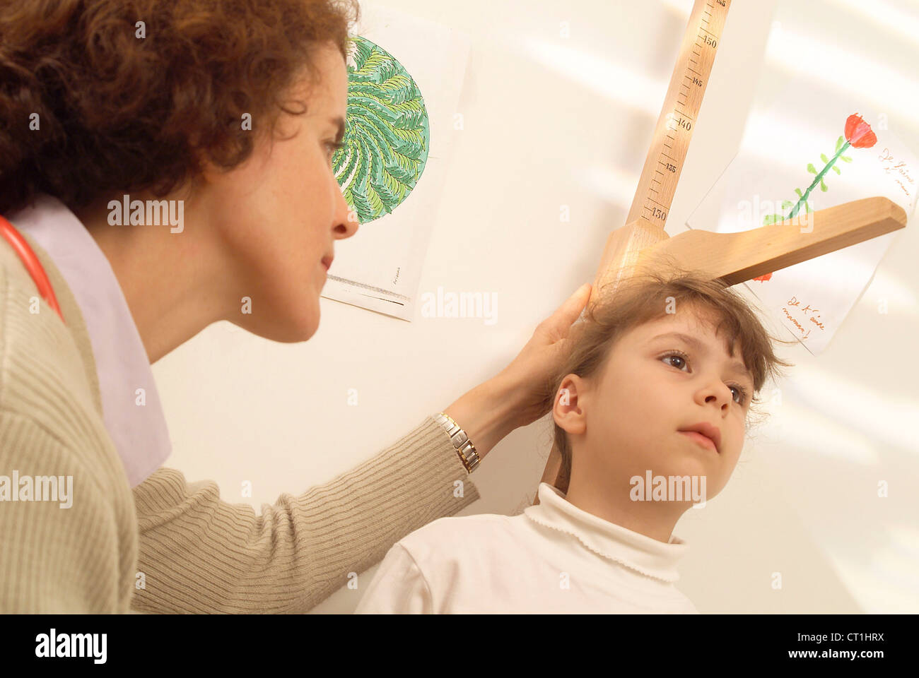 MEASURING HEIGHT IN A CHILD Stock Photo - Alamy