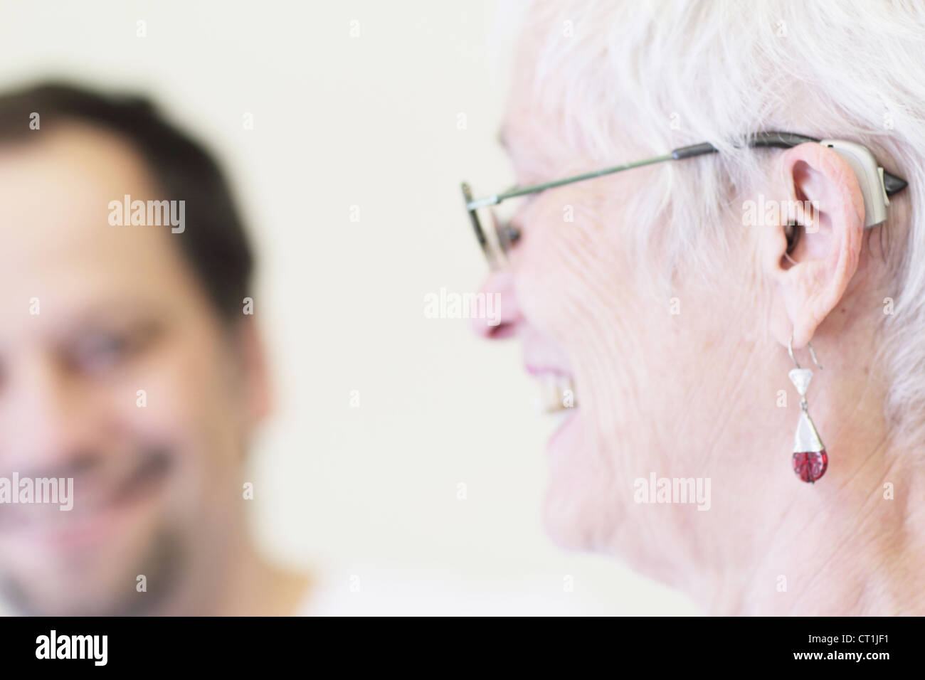 Close up of womans hearing aid Stock Photo - Alamy