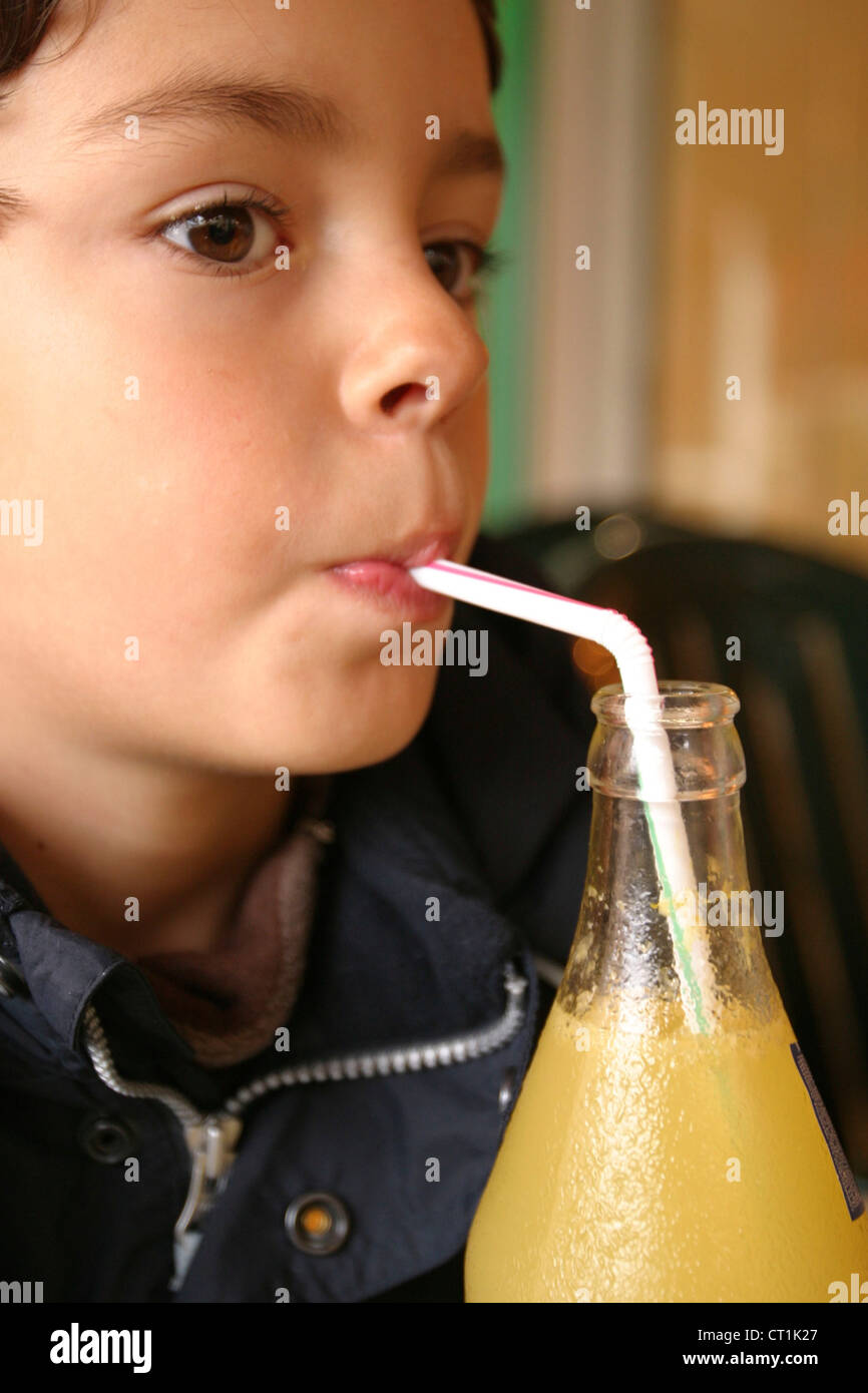 CHILD WITH COLD DRINK Stock Photo - Alamy