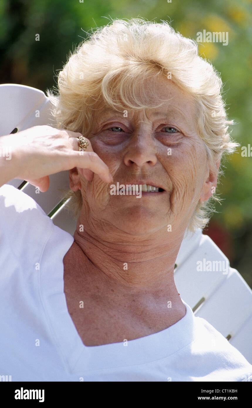 PORTRAIT OF +65 YR-OLD WOMAN Stock Photo - Alamy