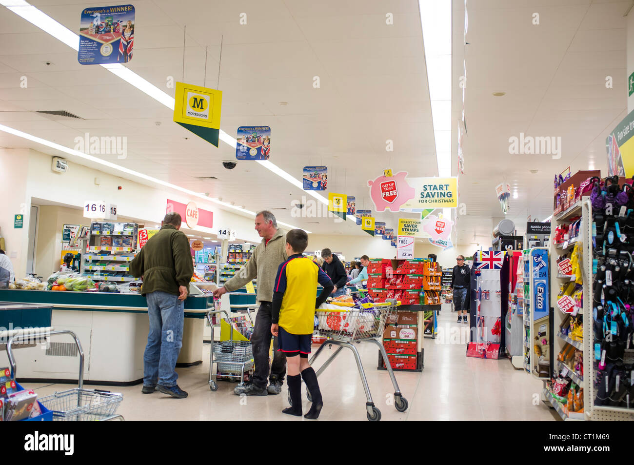 interior, people shopping for food at a branch of Morrisons supermarket ...