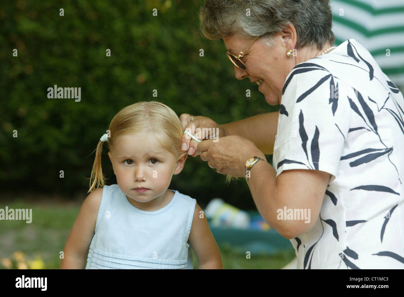 65 year old woman with children hi-res stock photography and images - Alamy