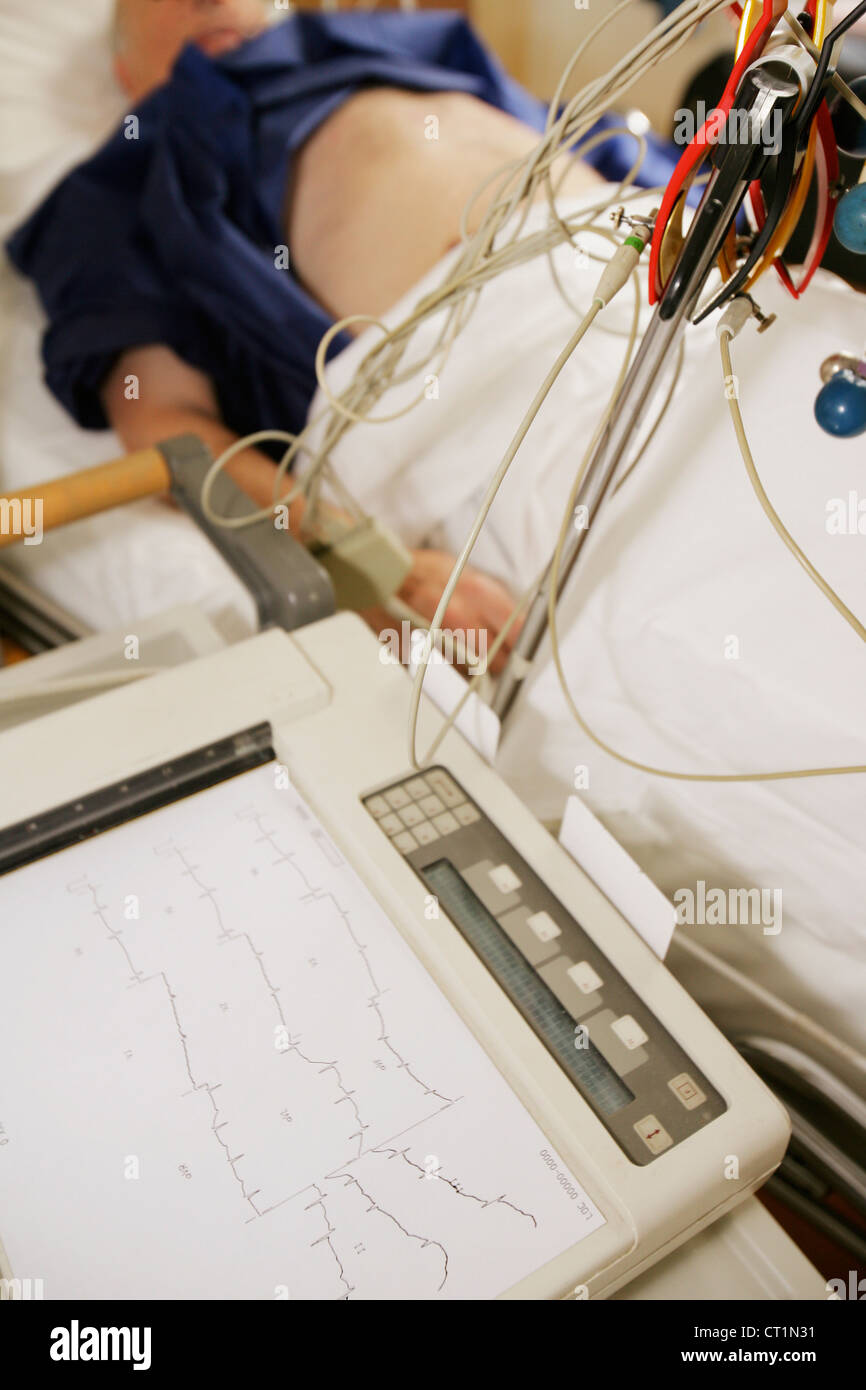 Male Patient Undergoes Ecg Electrocardiogram Stock Photos & Male ...