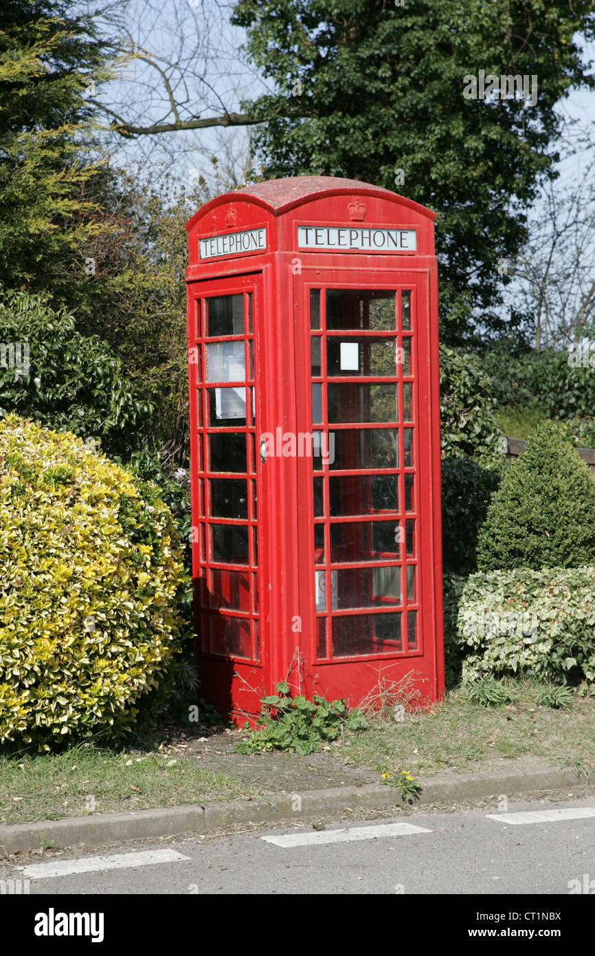 The red telephone box, a telephone kiosk for a public telephone ...