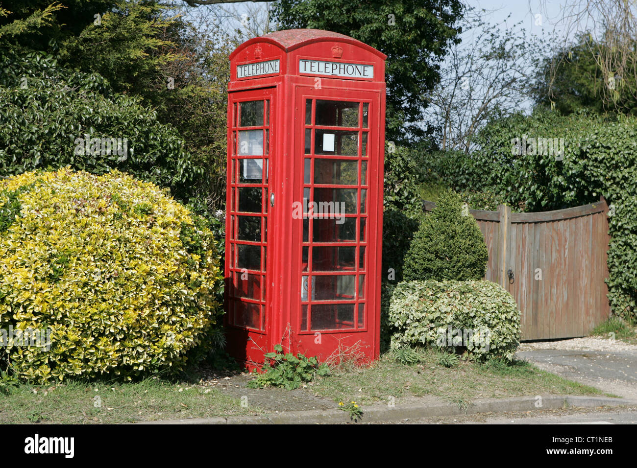 The red telephone box, a telephone kiosk for a public telephone ...