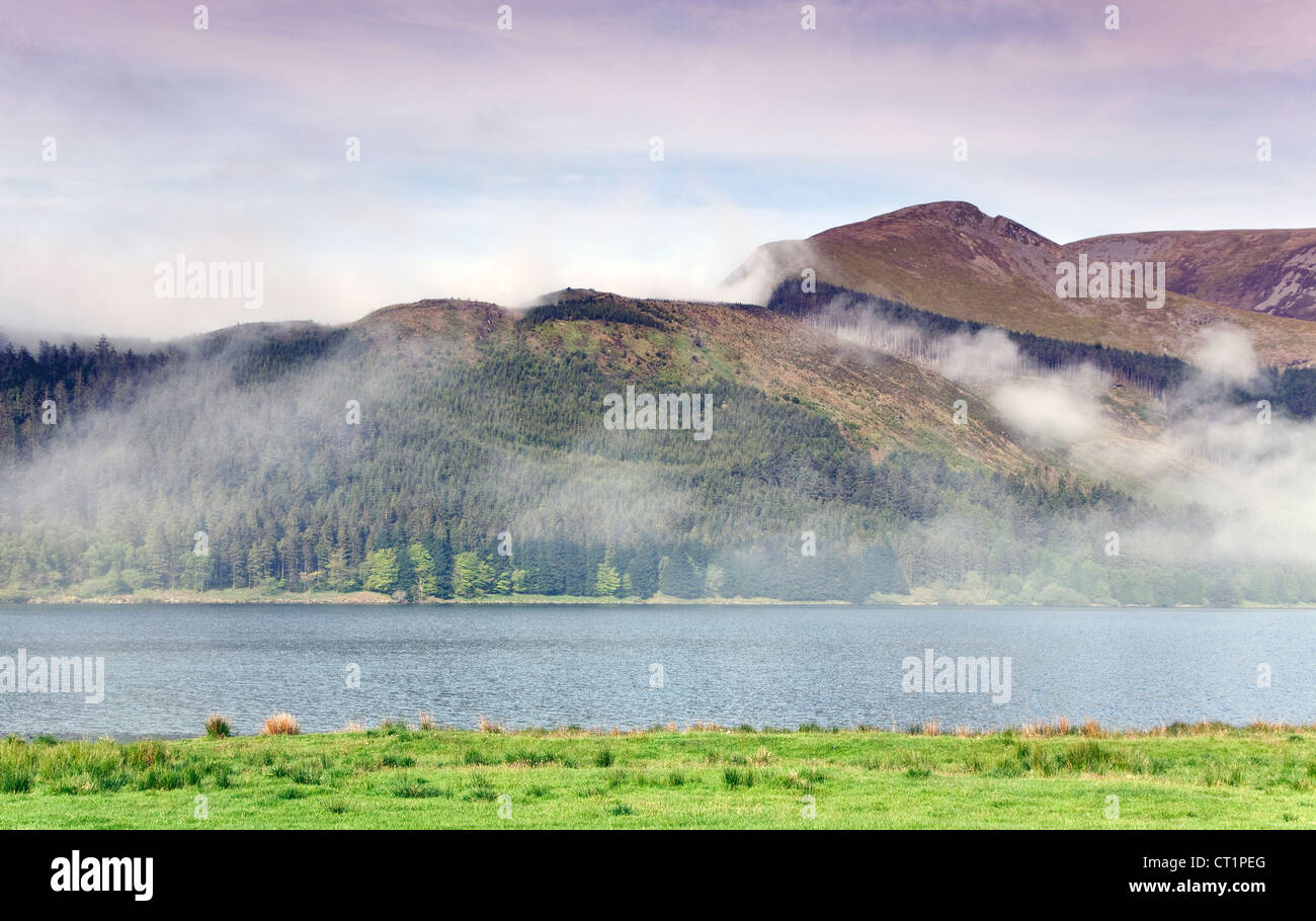 Mynydd Mawr towers above a misty Llyn Cwellyn in the Nant-y-Betws ...
