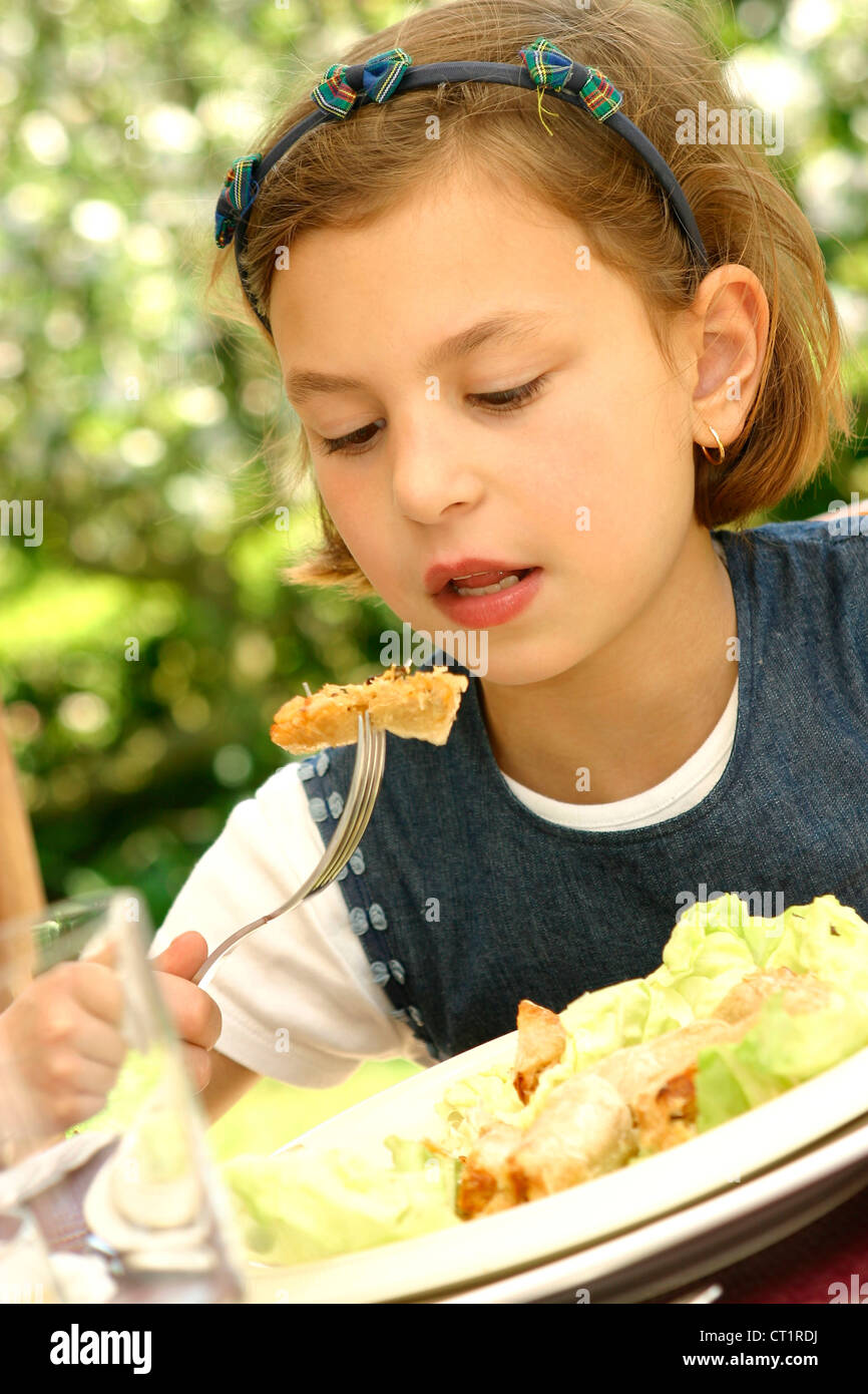 CHILD EATING A MEAL Stock Photo - Alamy