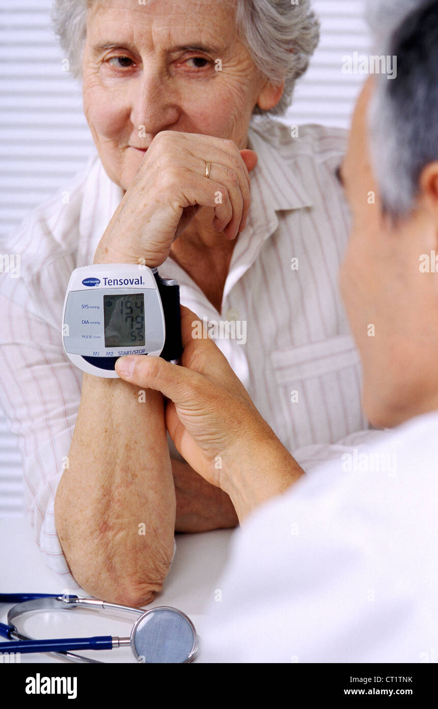 BLOOD PRESSURE, ELDERLY PERSON Stock Photo - Alamy