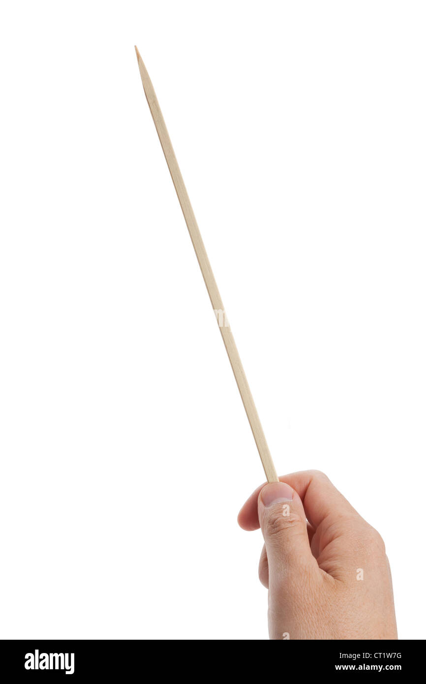 Hand holding Bamboo Skewer with white background Stock Photo - Alamy