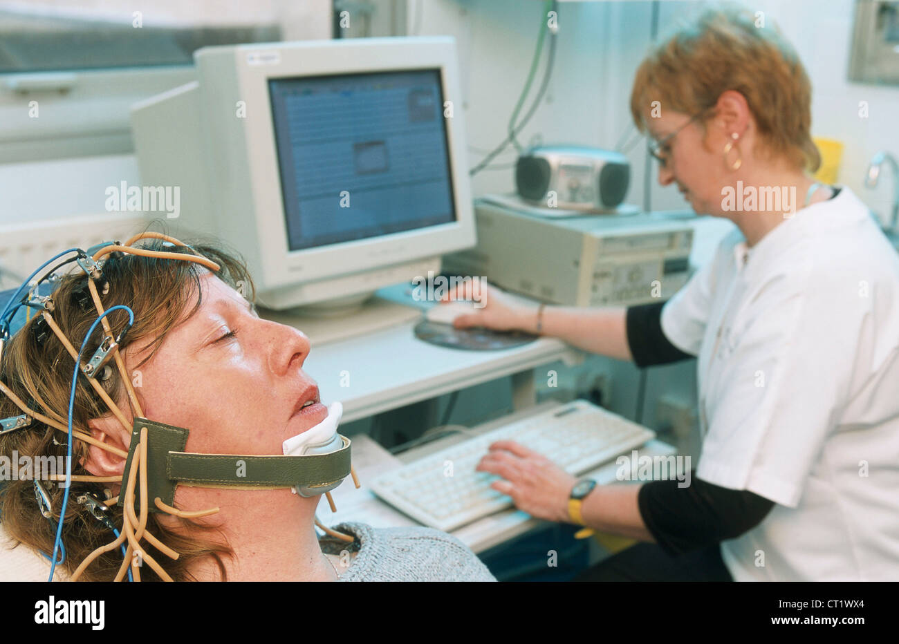 EEG EXAMINATION OF A WOMAN Stock Photo - Alamy
