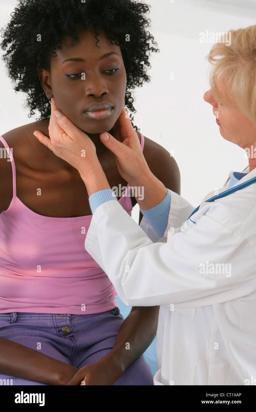 WOMAN PALPATING LYMPH NODE Stock Photo - Alamy