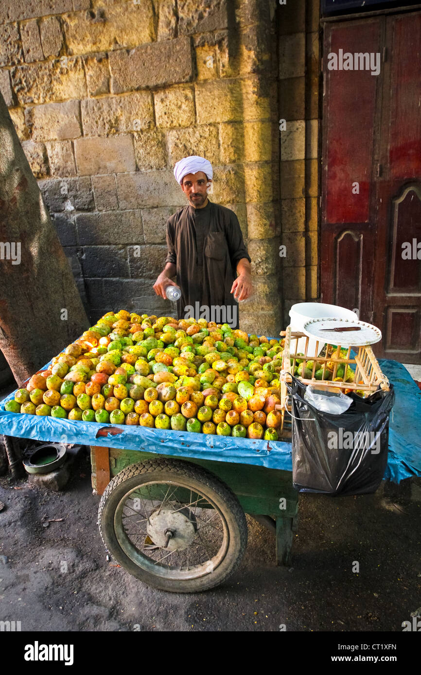 Upper Egyptian man sales prickly pears fruit on Hand Cart, Cairo, Egypt ...