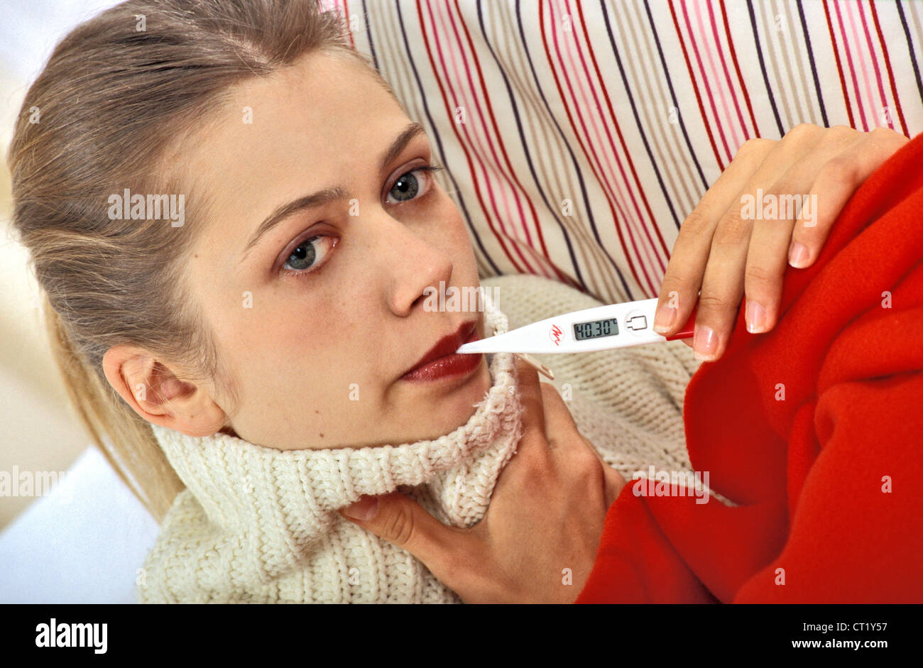 WOMAN WITH FEVER Stock Photo - Alamy