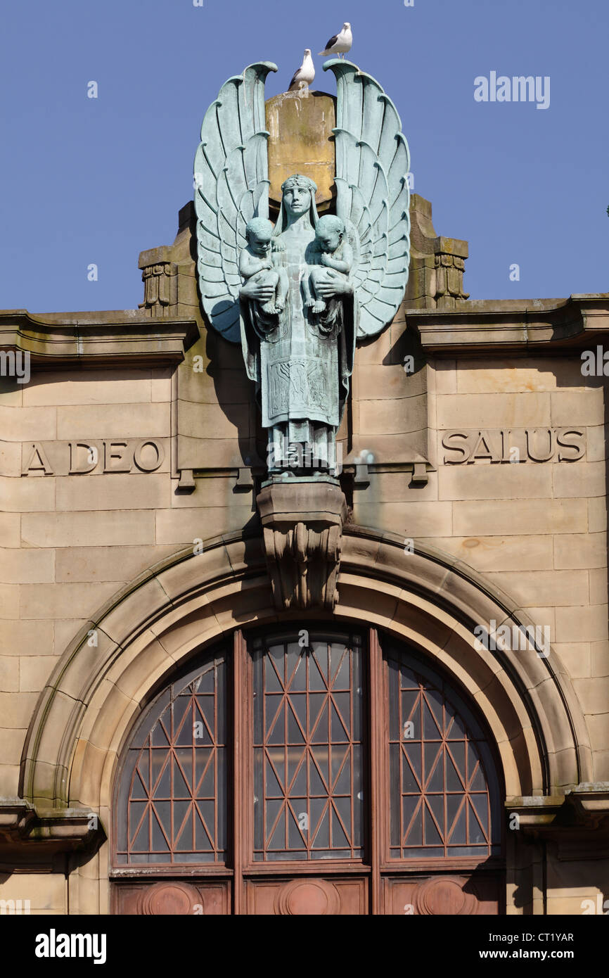 Russell Institute, Paisley, bronze guardian angel sculpture holding two ...