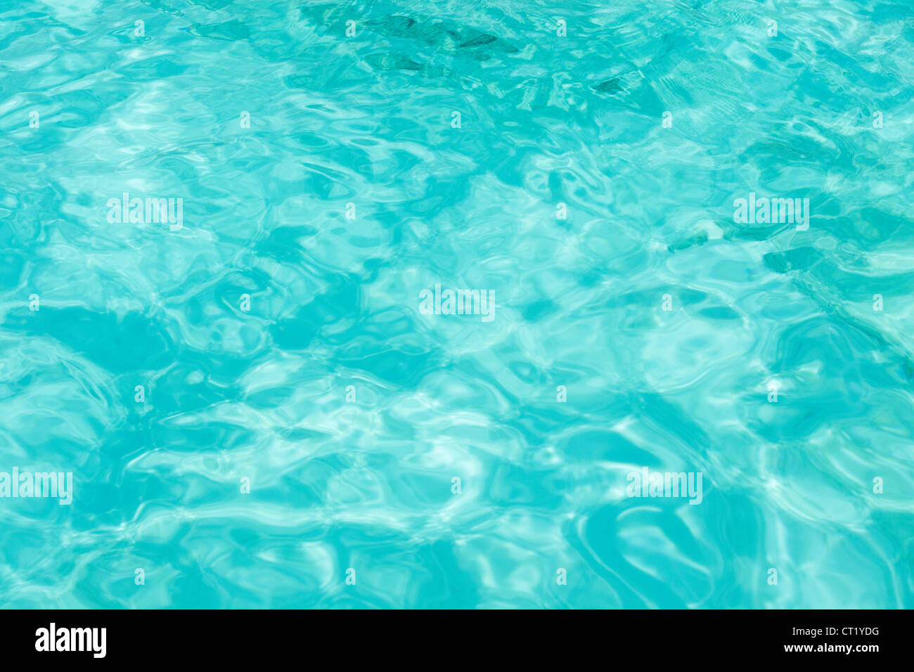 vivid turquoise sea background Stock Photo - Alamy