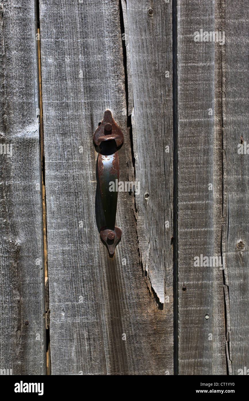 Iron door lock farm building Stock Photo - Alamy