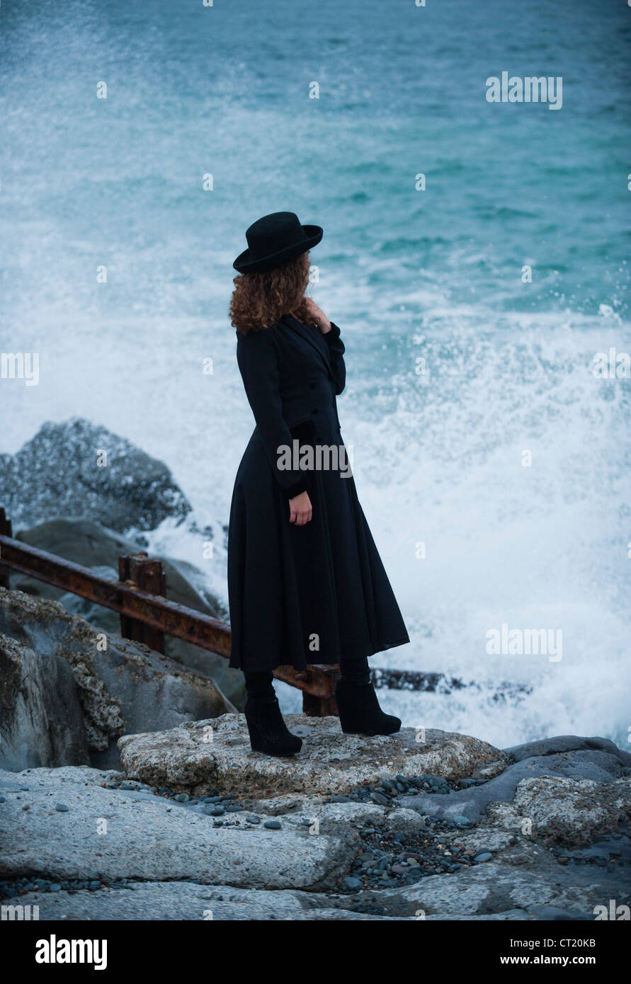 Long Black Coat Stock Photos & Long Black Coat Stock Images - Alamy