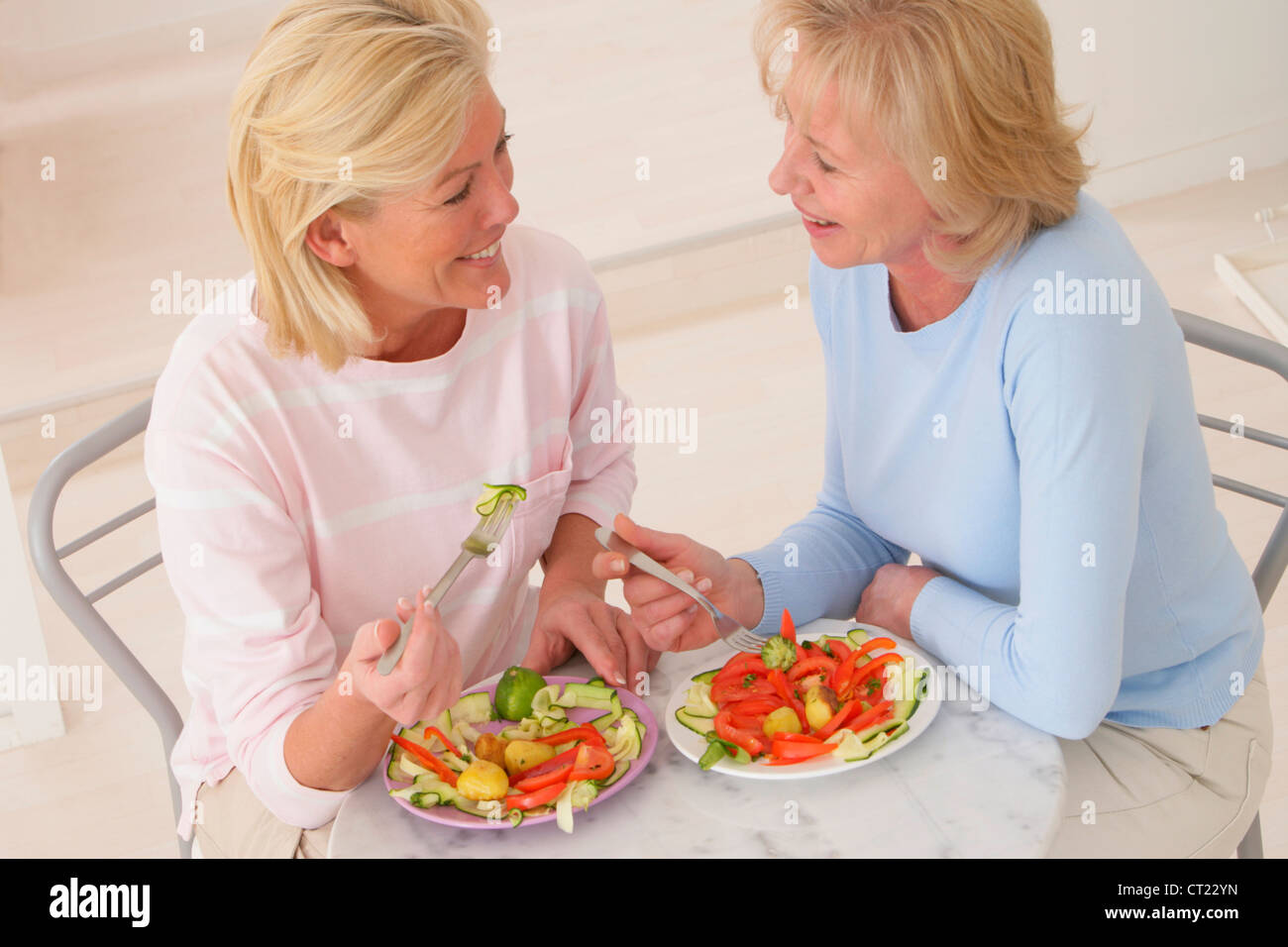 ELDERLY PEOPLE EATING A MEAL Stock Photo - Alamy