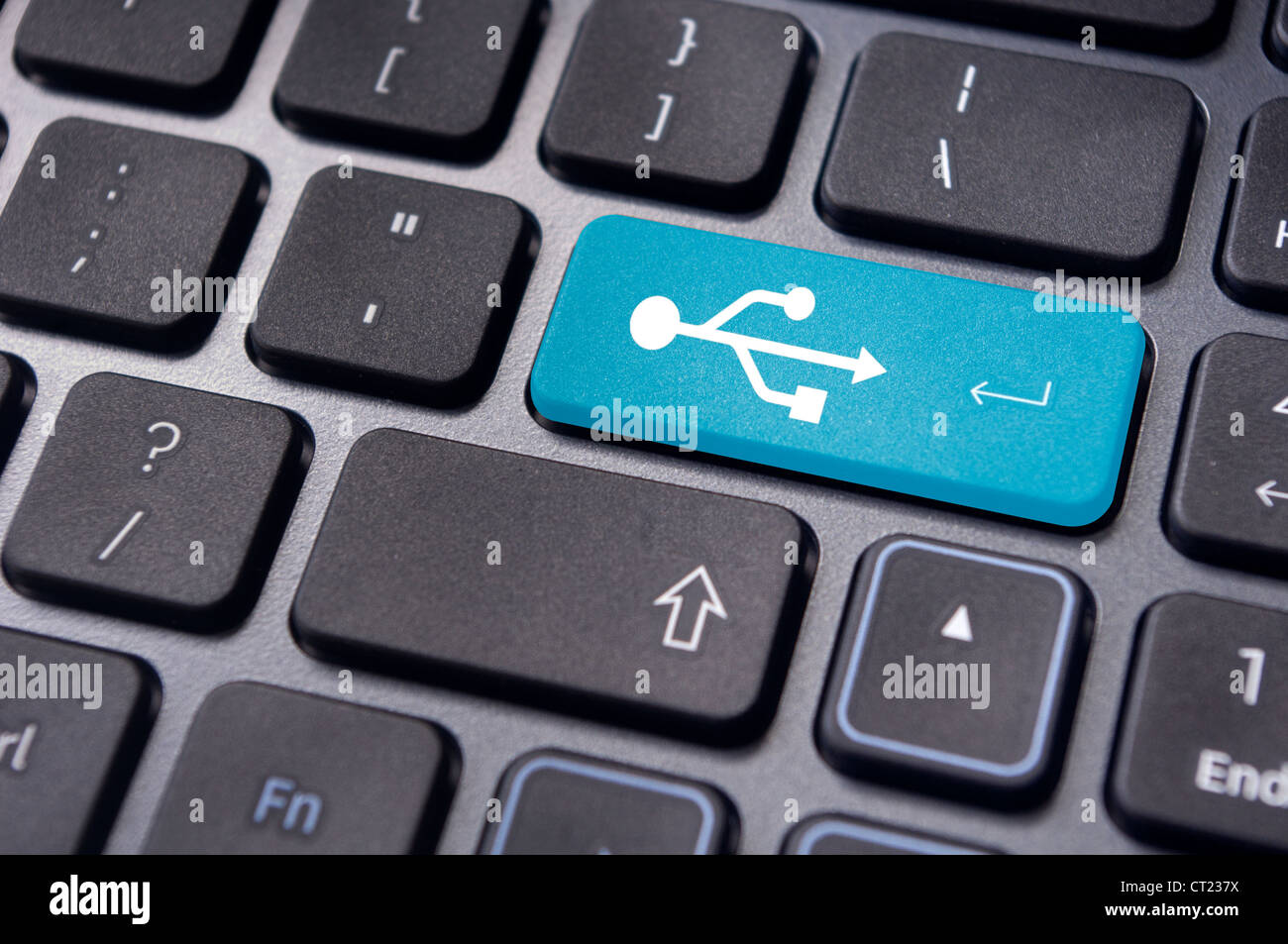 USB signs on enter key of keyboard, for concepts of USB ready devices ...