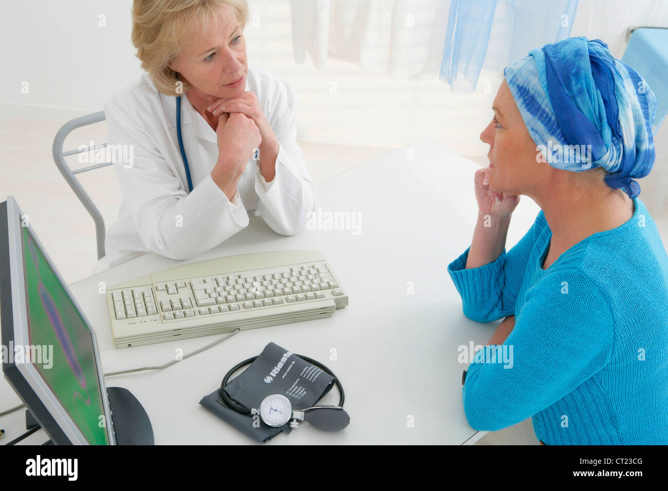 CANCER CONSULTING ELDERLY PERSON Stock Photo - Alamy