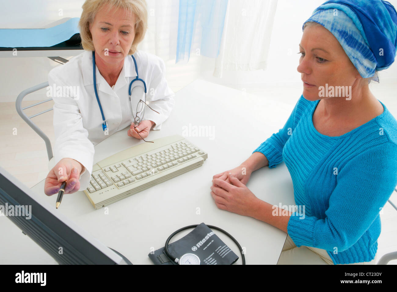 CANCER CONSULTING ELDERLY PERSON Stock Photo - Alamy