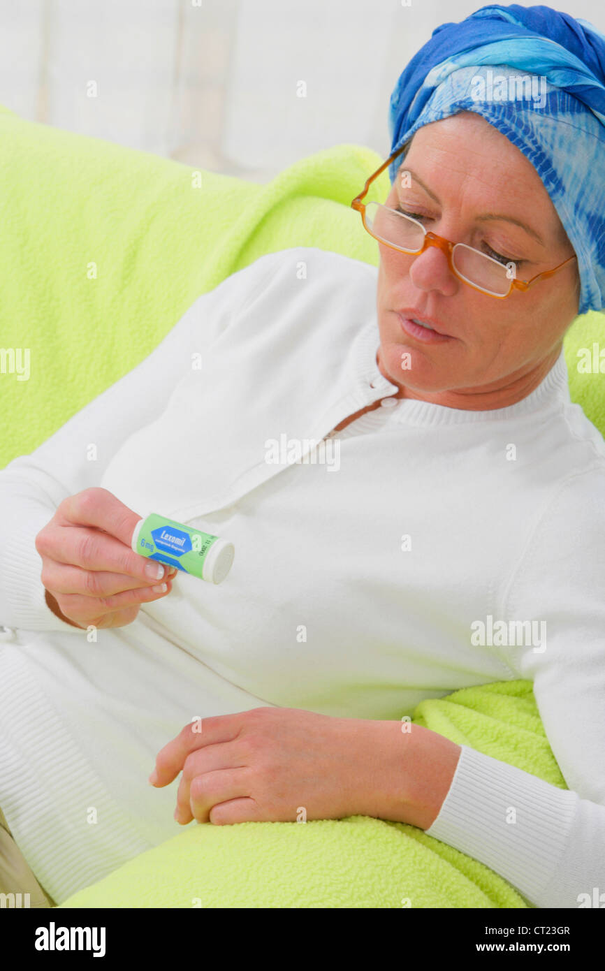 ELDERLY PERSON TAKING MEDICATION Stock Photo - Alamy