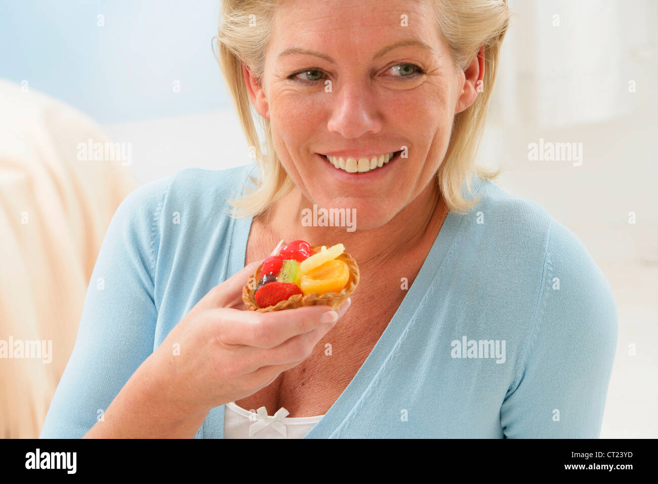 ELDERLY PERSON SNACKING Stock Photo - Alamy