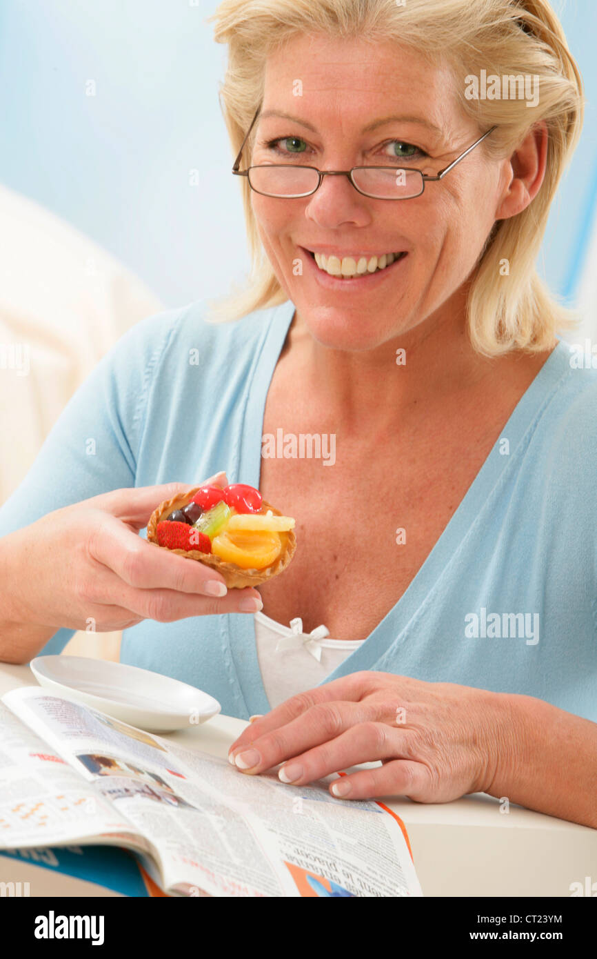 ELDERLY PERSON SNACKING Stock Photo - Alamy