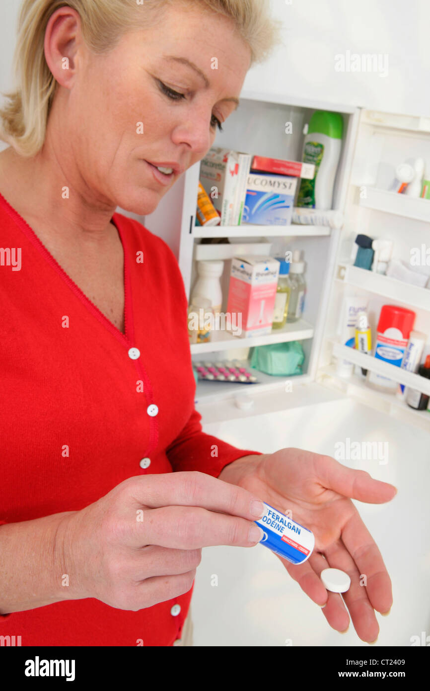 ELDERLY PERSON TAKING MEDICATION Stock Photo - Alamy