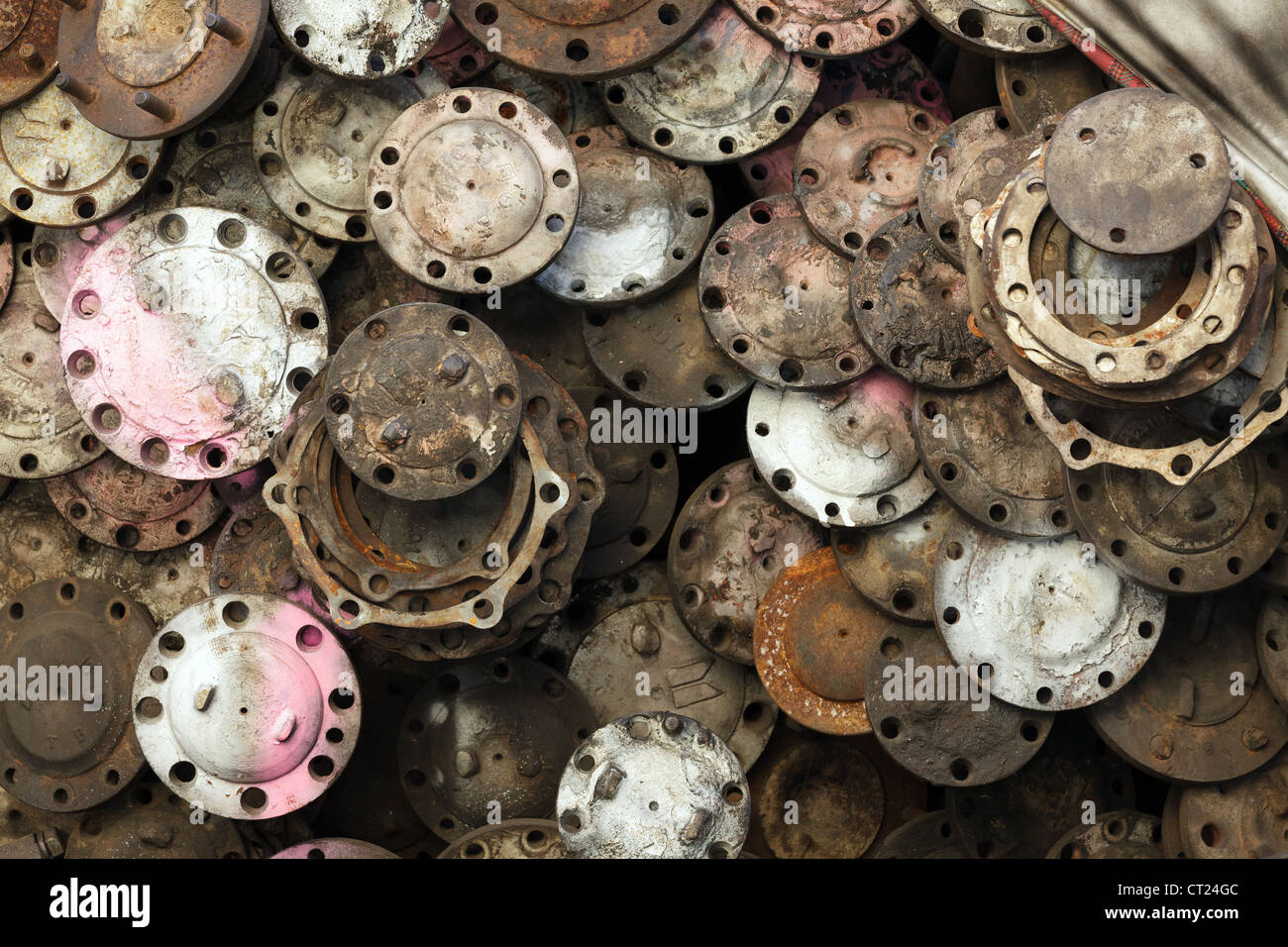 stack of rusted metallic car parts in garage Stock Photo - Alamy