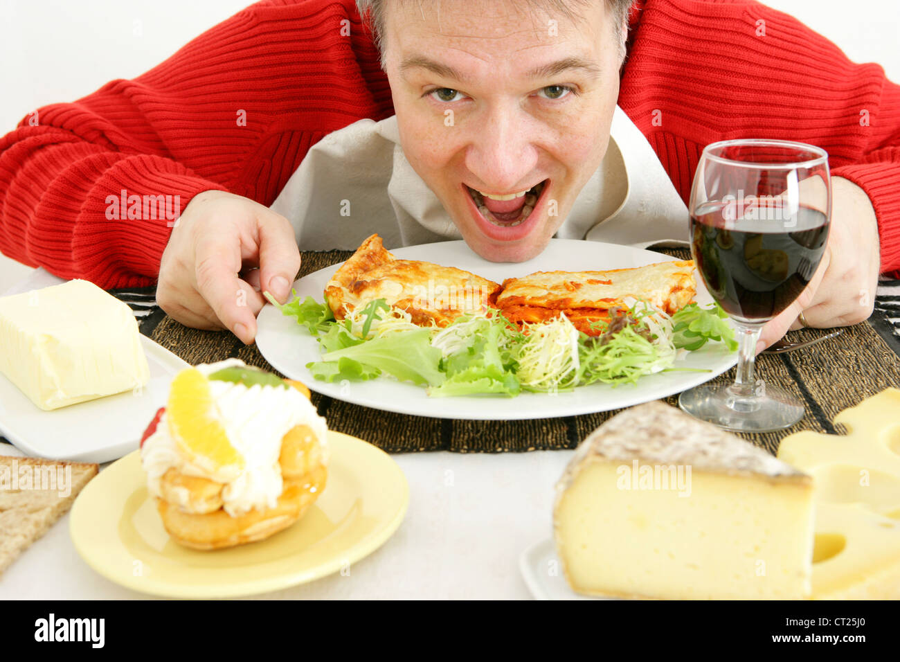 Devouring cake hi-res stock photography and images - Alamy