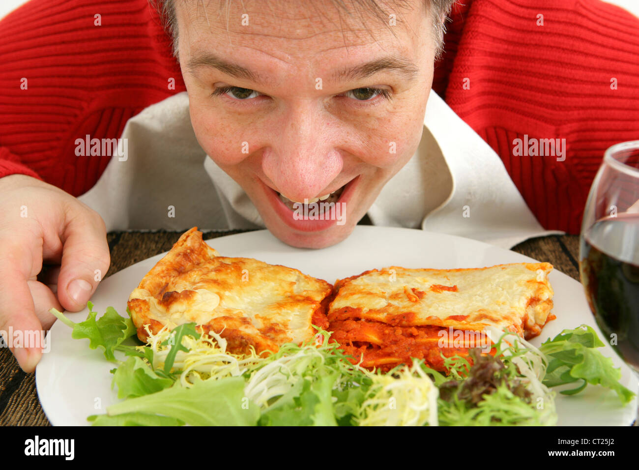 MAN EATING A SANDWICH Stock Photo - Alamy
