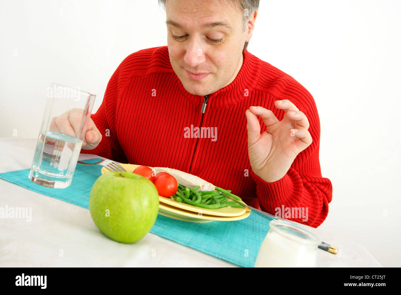 MAN EATING MEAT Stock Photo - Alamy