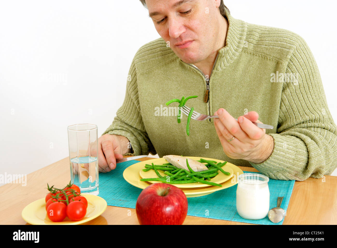 MAN EATING MEAT Stock Photo - Alamy