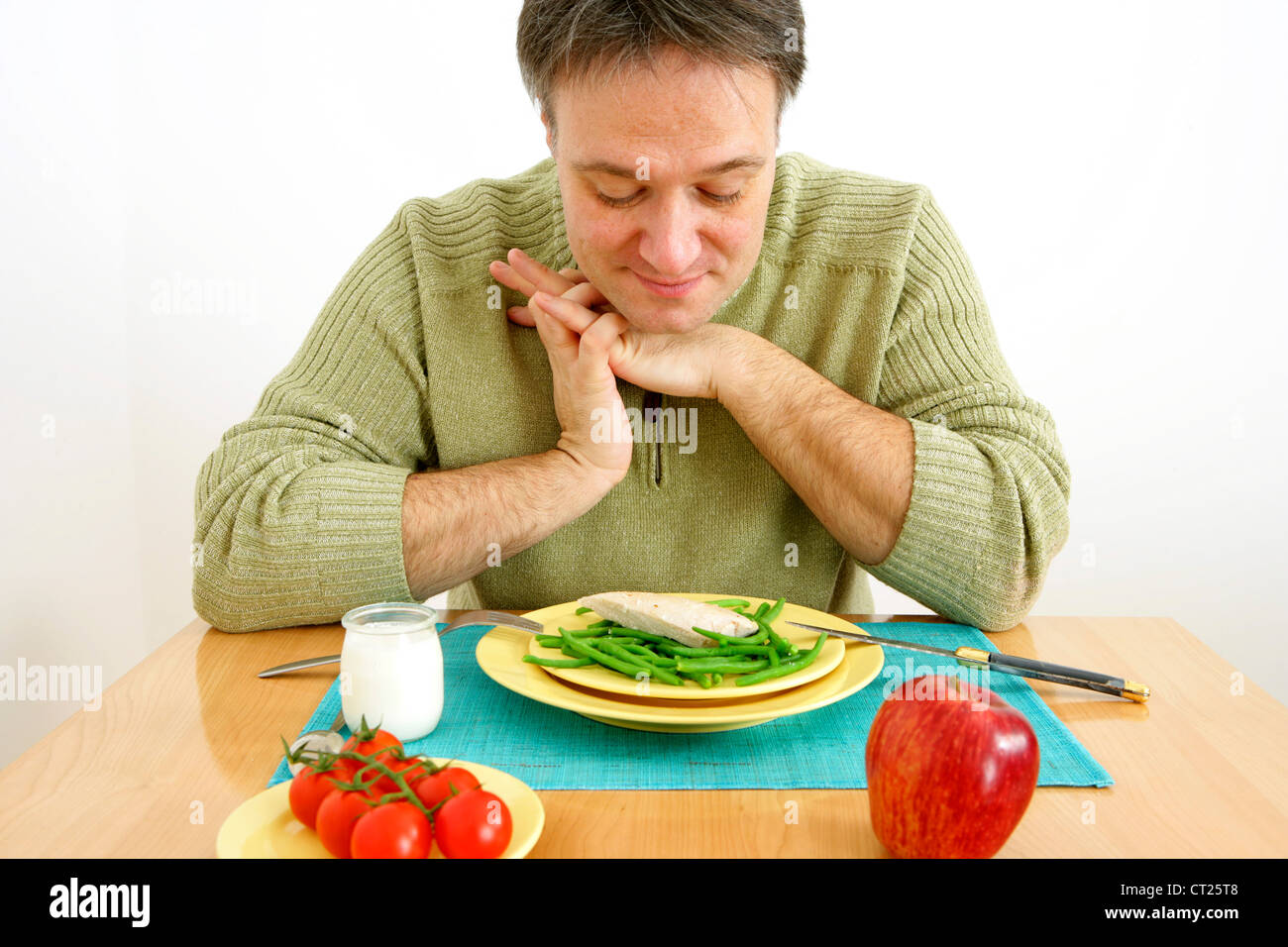 MAN EATING MEAT Stock Photo - Alamy