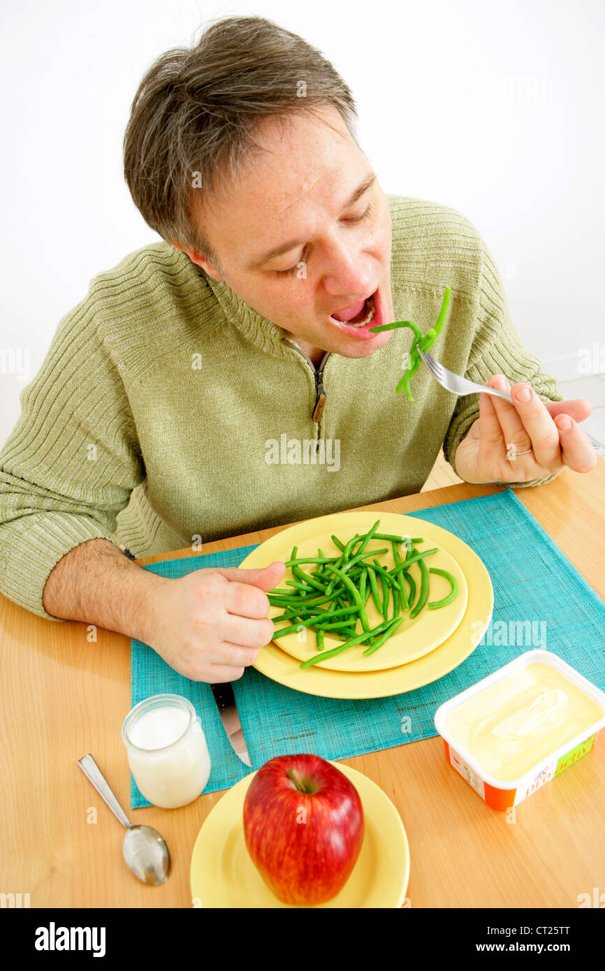 MAN EATING A MEAL Stock Photo - Alamy