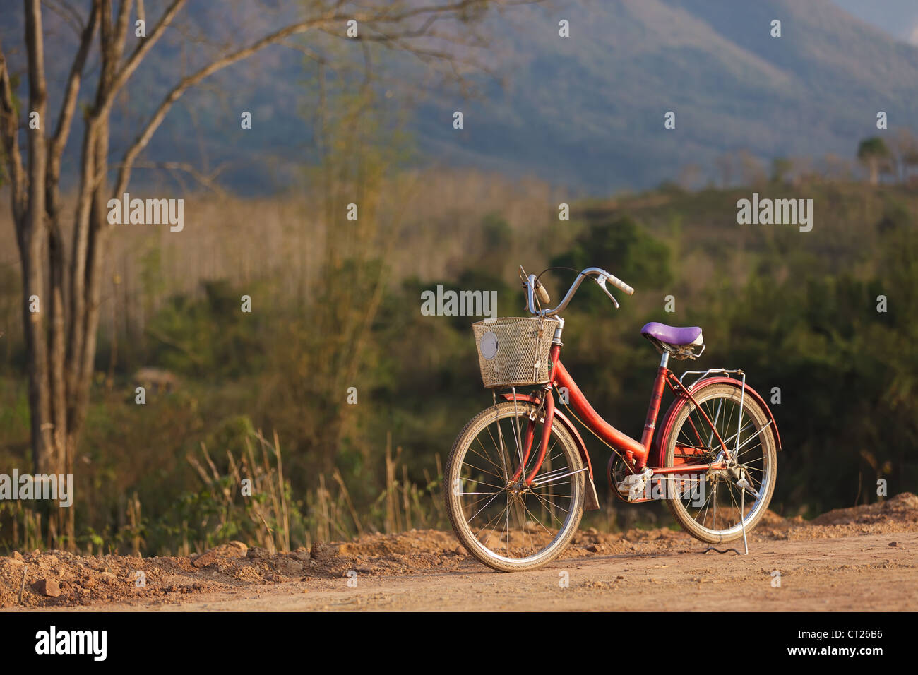 bicycle tourism in wild tropical landscape, Laos Stock Photo - Alamy