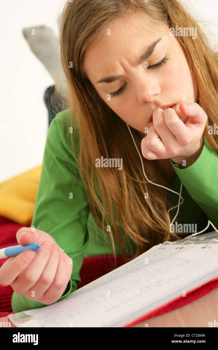 TEENAGER DOING HOMEWORK Stock Photo - Alamy