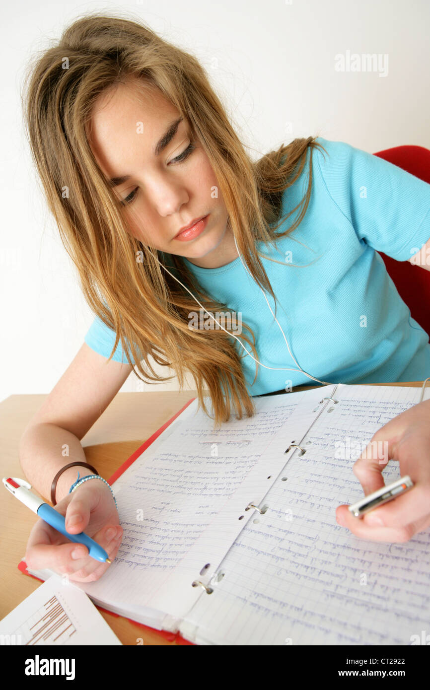 TEENAGER DOING HOMEWORK Stock Photo - Alamy